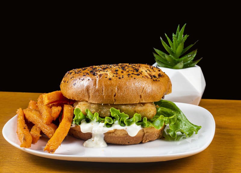 Haddock Sandwich on a Everything Brioche Bun Stock Photo - Image of ...