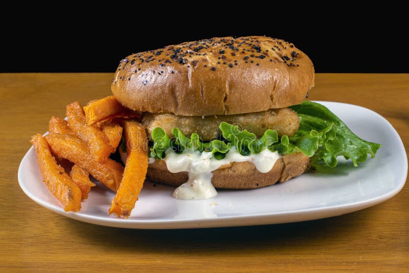 Haddock Sandwich on a Everything Brioche Bun Stock Image - Image of ...