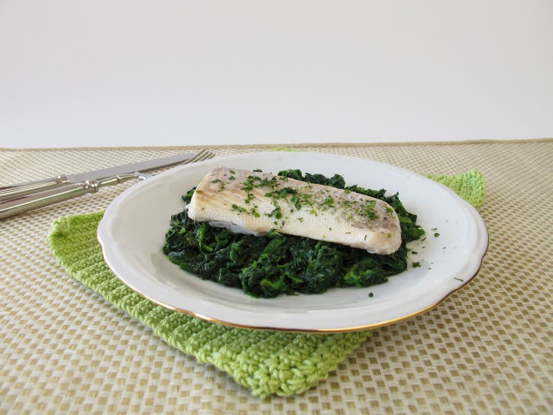 Haddock with spinach stock photo. Image of vegetable - 52285324