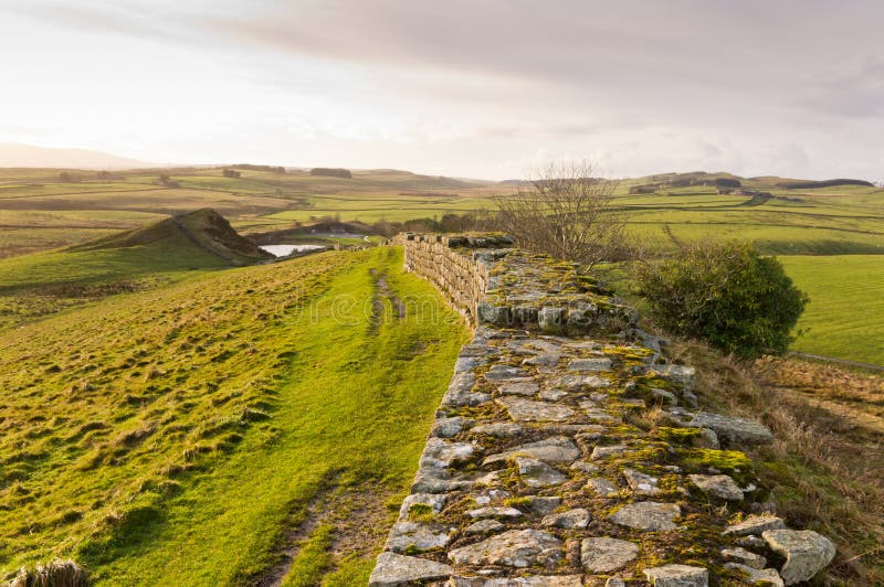Hadrians Wall and Cawfields Quarry Beyond Stock Photo - Image of ...