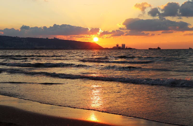 Haifa Bay Beach at sunset stock image. Image of cloudy - 160172101