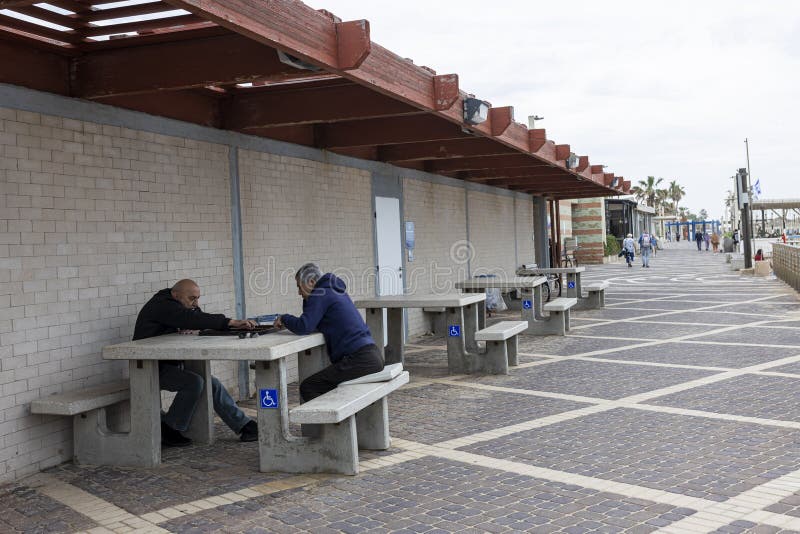 Two Men Play Backgammon Near the Beach at a Table Editorial Image ...