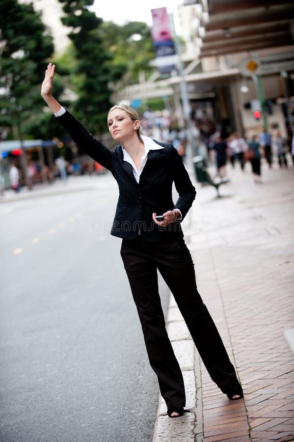 Hailing a Cab stock image. Image of standing, urban, adult - 7601447