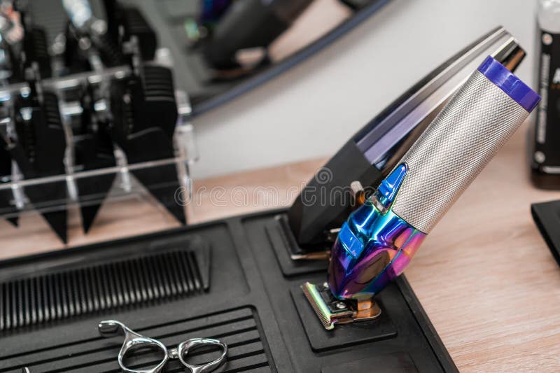 Hair Clippers, Scissors, and Combs are on the Table in the Barbershop ...