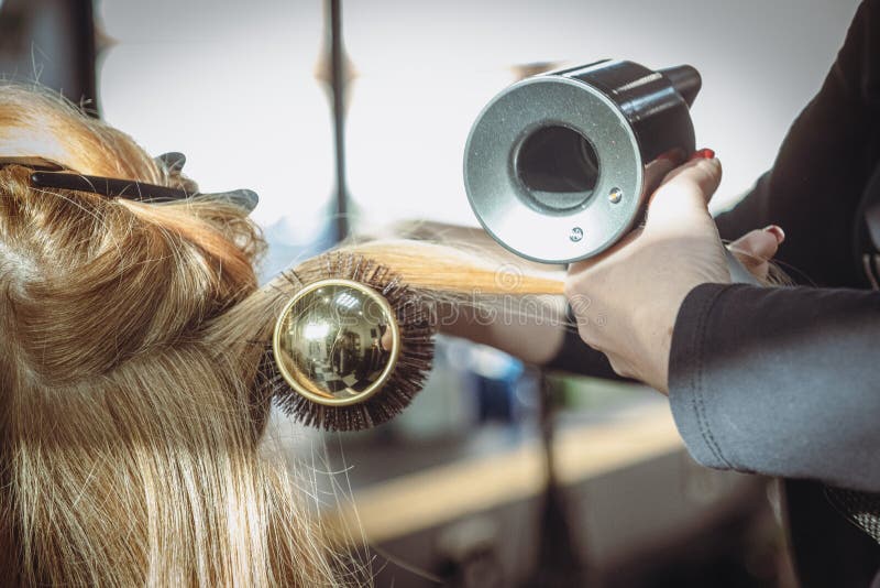 Professional Hair Stylist stock image. Image of paint - 233735083