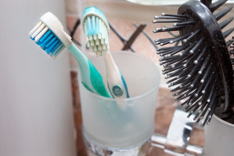 Toothbrushes And Hairbrush In Pastel Tones Stock Image - Image of fresh ...