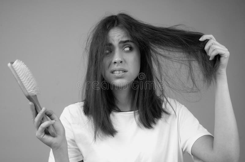 Hair Loss Woman with a Comb and Problem Hair. Hairloss and Bald ...