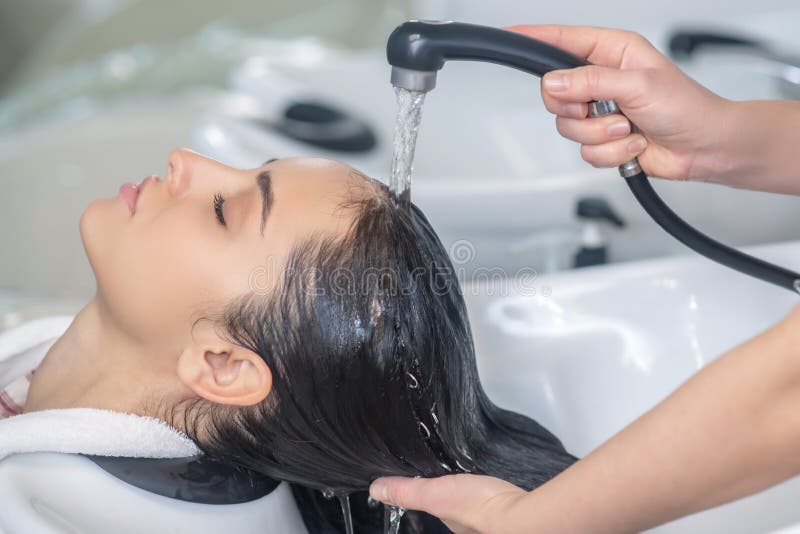 Hair Stylist Rinsing Hair of Her Client Stock Photo - Image of washing ...