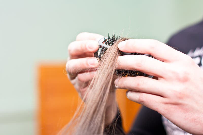 Hairdresser Cheat Hair in a Comb Stock Photo - Image of barber ...