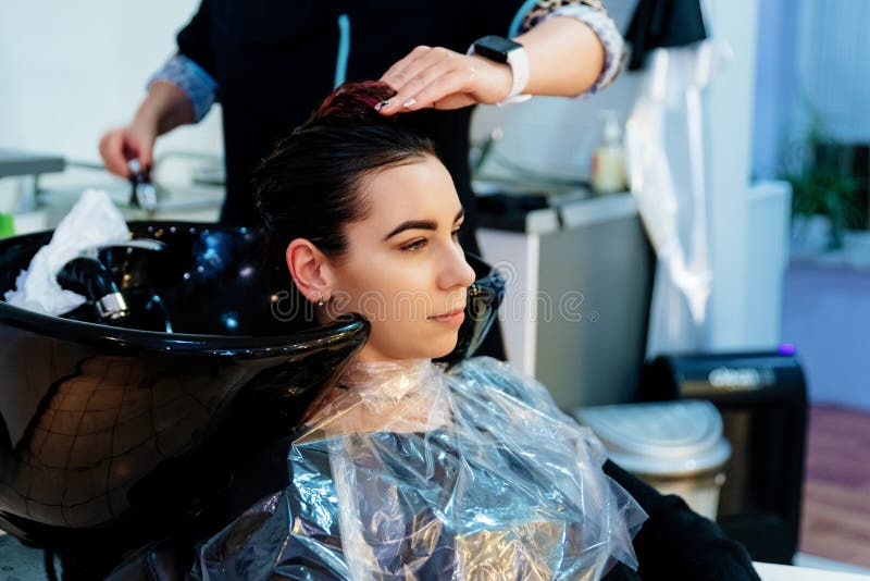 Hairdresser Washing Young Woman Customer Hair in Salon Stock Photo ... Hairdresser Washing Young Woman Customer Hair in Salon Stock Photo ...