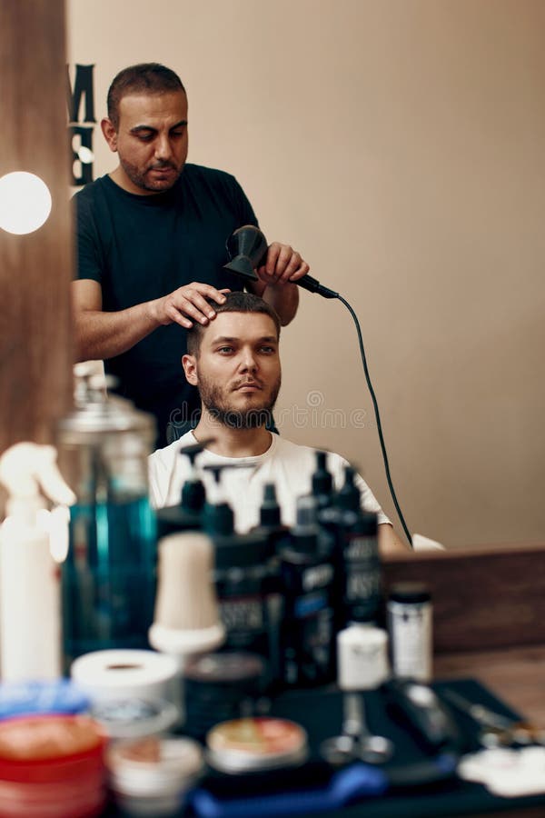 Hairdresser during Work with Client in Barber Shop Stock Photo - Image ...