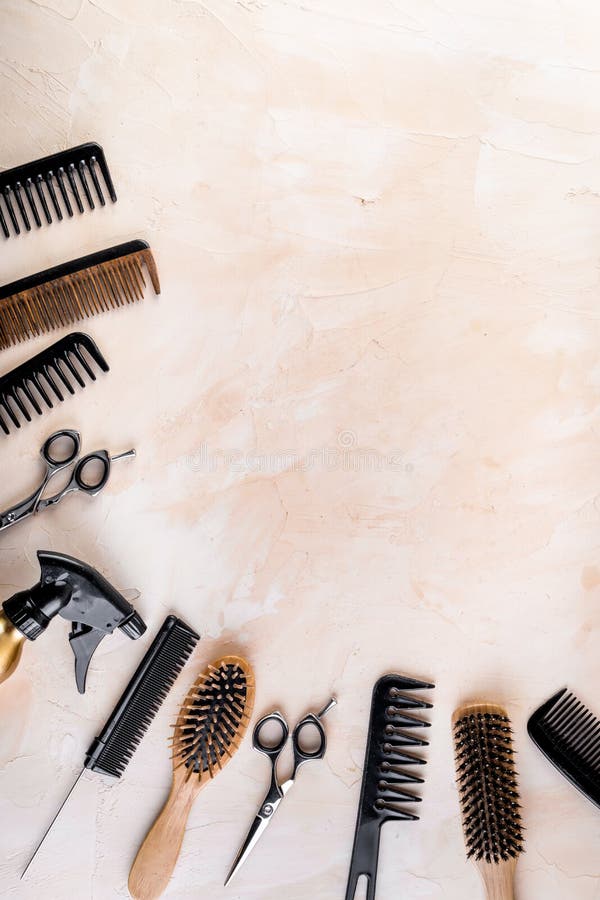 Hairdressing Instruments. Combs, Scissors and Spray on Beige Desk from ...