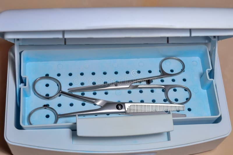 Hairdressing Scissors in a Disinfection Box Stock Image - Image of ...