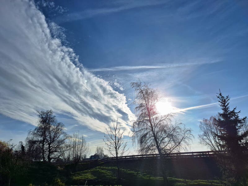 A Half Blue Sky with Clouds and the Sun Stock Image - Image of light ...