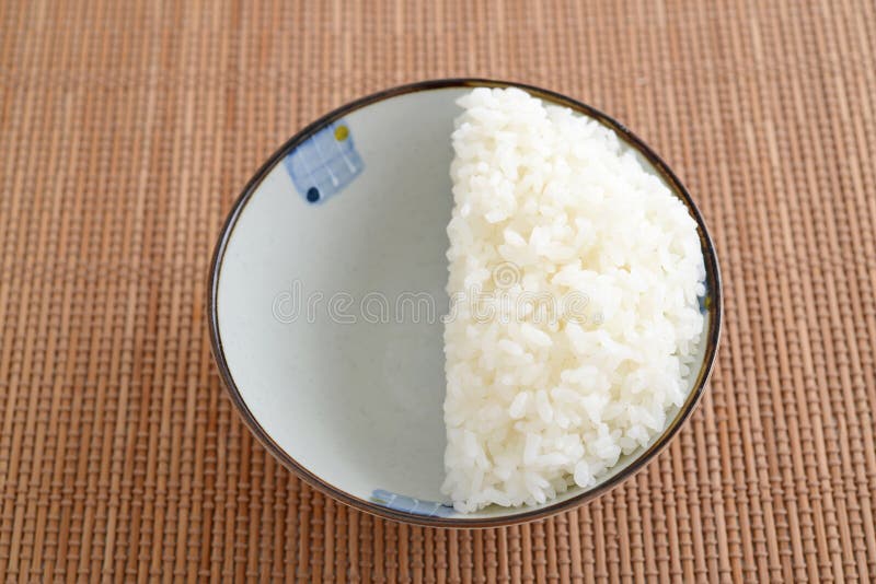 Half a bowl of rice. stock photo. Image of japan, nutrition - 143220576