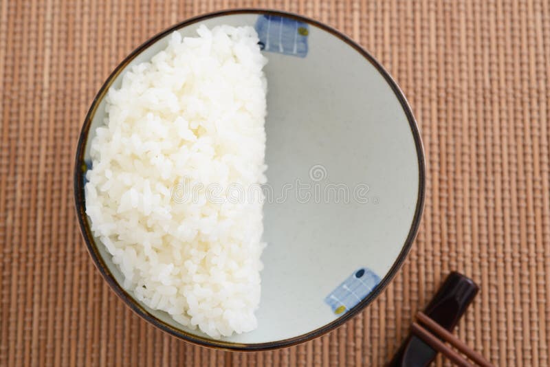 Half a bowl of rice. stock image. Image of health, dish - 143220793
