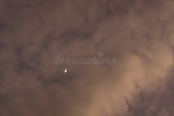 Half Bright Moon in the Middle of Cloudy Sky Background Stock Photo ...