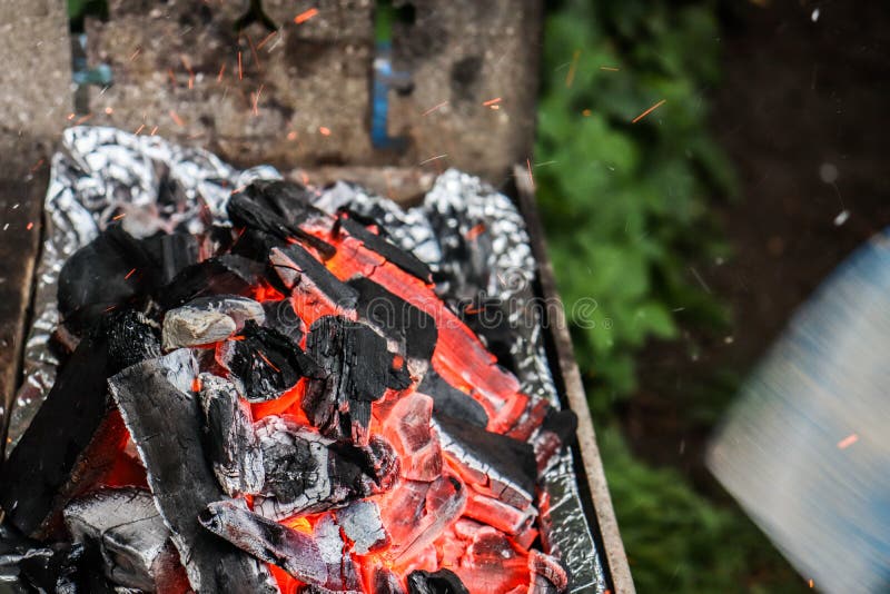 Half Burned Coal with Sparks Flying Around Stock Photo - Image of rock ...