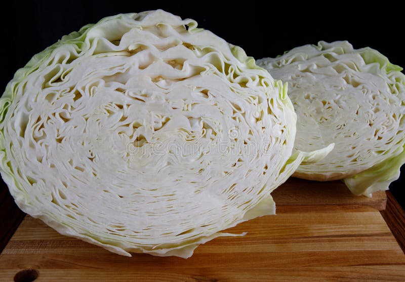 Half Cabbage and Chopped Cabbage on a Cutting Board Stock Image - Image ...