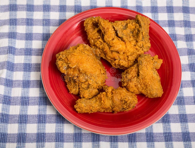 Half Chicken on Red Plate stock image. Image of delicious - 50239507