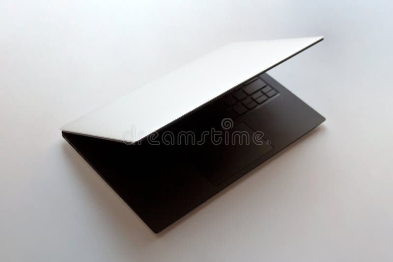 Half Closed Laptop on White Background Stock Image - Image of abstract ...