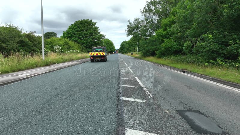 Micro Asphalt Road Resurfacing Process on an English Road Stock Video ...