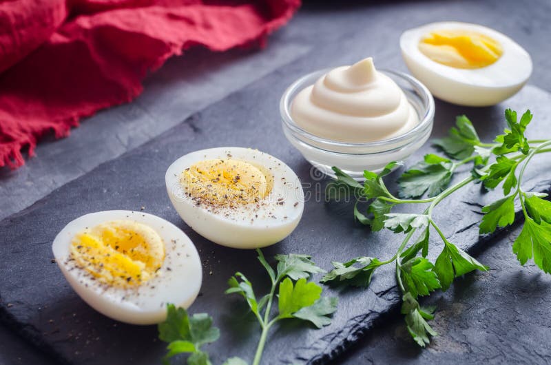 Half Cooked Chicken Eggs on a Plate. Stock Photo - Image of slate, diet ...