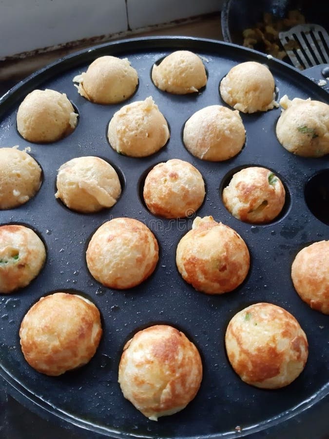 Half-cooked takoyaki stock photo. Image of canada, vertical - 260943114