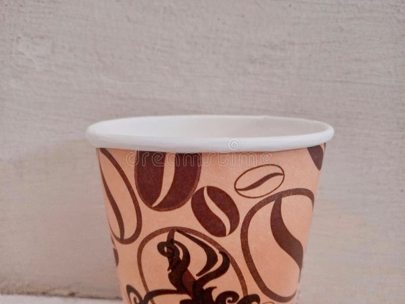 Half Cup of Coffee with Coffee Theme Wrapper Stock Image - Image of ...