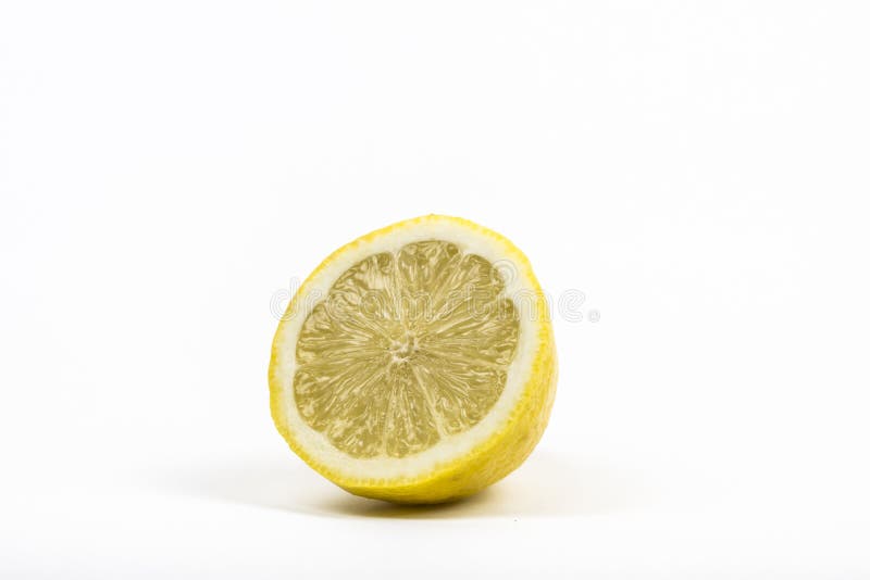 A Half Cut Lemon Isolated in White with Copy Space. Stock Photo - Image ...