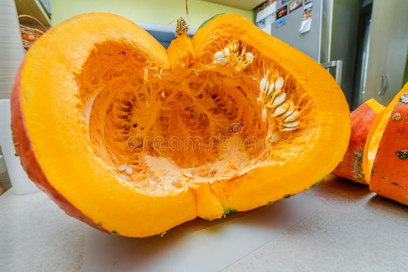 Half of a Cut Pumpkin on a Table Stock Photo - Image of immunity, fruit ...