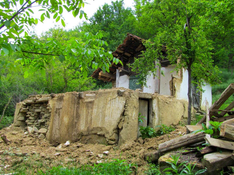 Half-destroyed old house stock photo. Image of village - 381599818