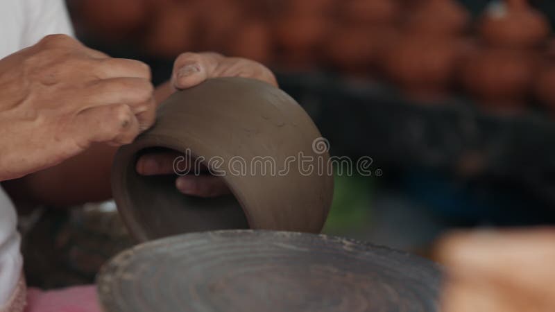 Half Done Jug from Polymer Clay Getting Polished by Hand Stock Footage ...