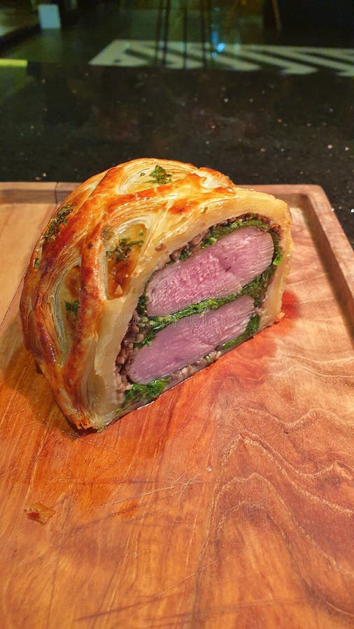 Half a Duck Wellington stock photo. Image of steak, grilling - 259420350