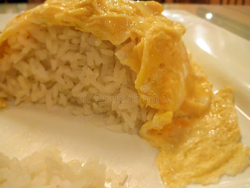 Half Eaten Plate of Omellete Over Rice Stock Photo - Image of thailand ...