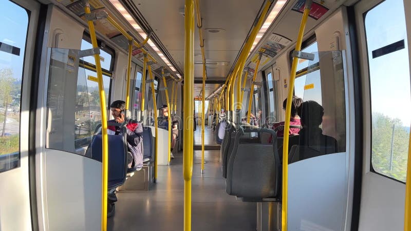 A Half-empty Skytrain Wagon in Which Some People Ride, Stagger and Ride ...