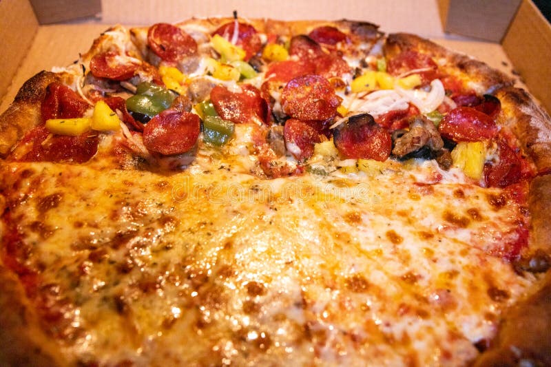 Half Extra Cheese and Half Supreme Italian Pizza Stock Image - Image of ...