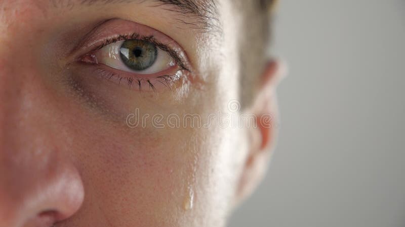 Half Face Portrait of Depressed Man Crying with Tears in Eye. Man in ...