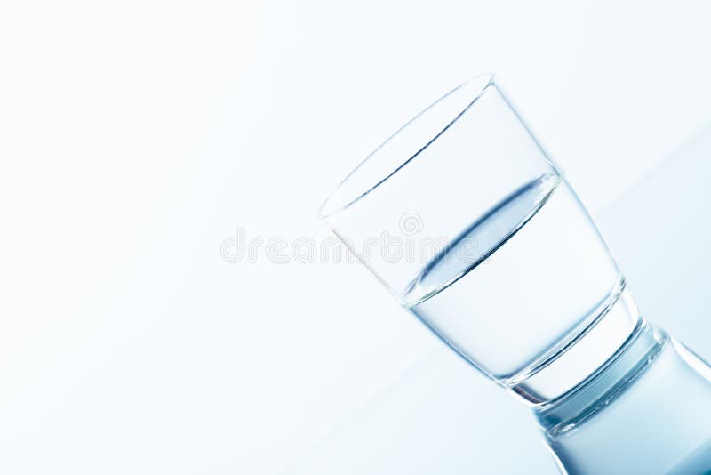 Glass Half Full Concept stock photo. Image of table - 178236310