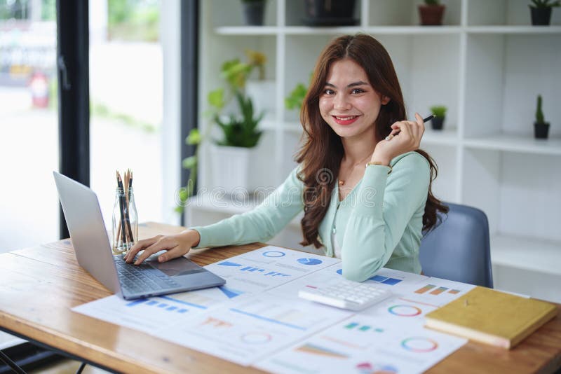 Half Girl Using Computers and Documents To Work at Office Stock Image ...
