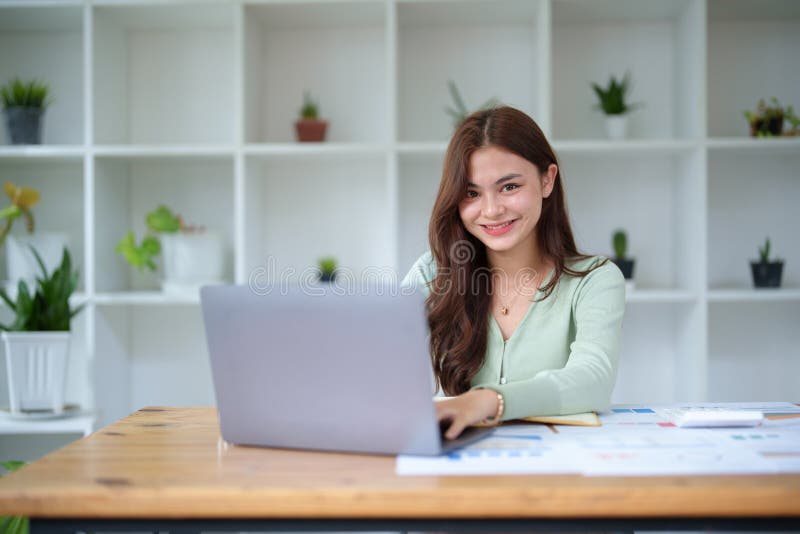 Half Girl Using Computers and Documents To Work at Office Stock Image ...