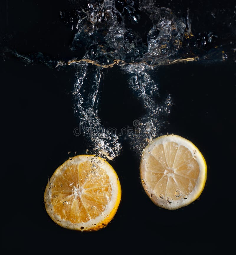 Lemon in water splash stock image. Image of healthy, bubble - 21610527