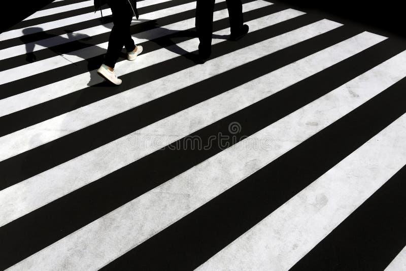 Half a Man Walking Across a Zebra Crossing Stock Photo - Image of ...