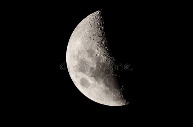 A Half Moon on a Black Night Sky Stock Photo - Image of phase, cycle ...