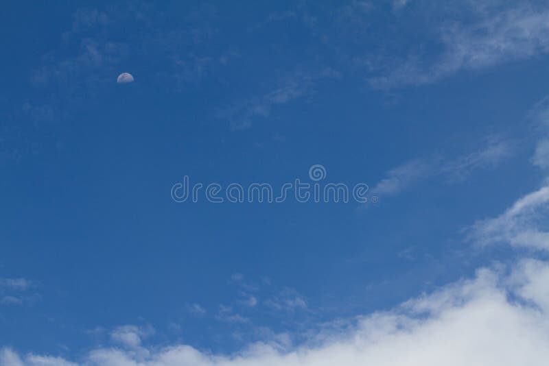 Half moon in the blue sky stock photo. Image of blue - 185442172