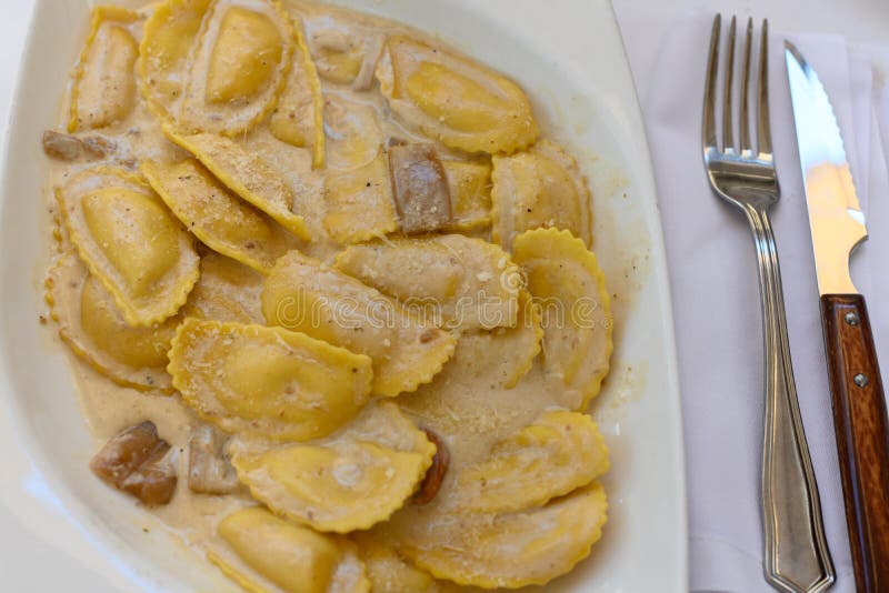 Half Moon Pasta Dish with Mushroom and Truffle Sauce Stock Image ...