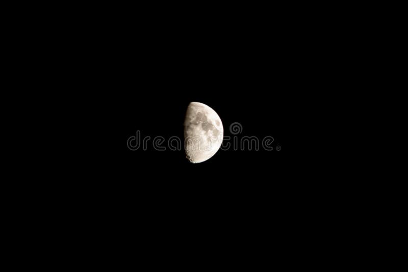 Half Moon Surface Phase Macro with Dark Background Stock Image - Image ...