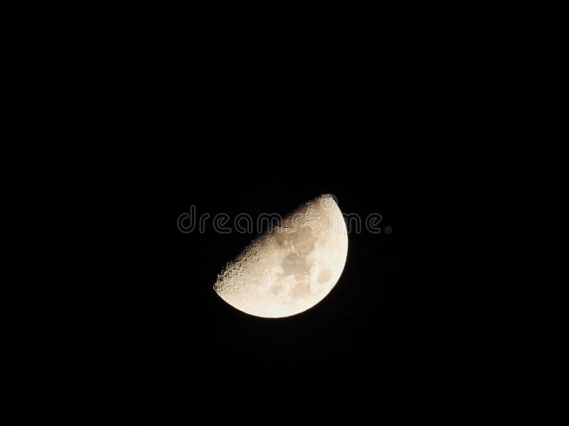 Half Moon in the Winter Night Sky: a Luminous Half Moon with Details of ...