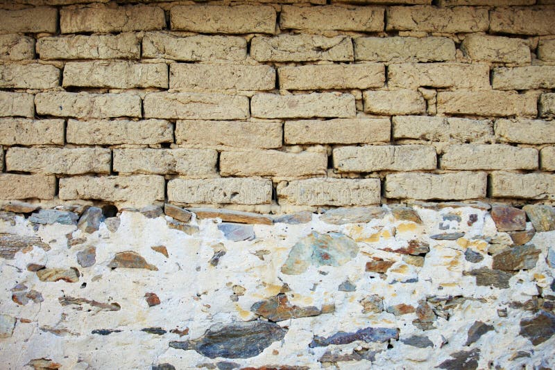 Half Mud Brick and Half Decorative Stone on the Wall of the House Stock ...