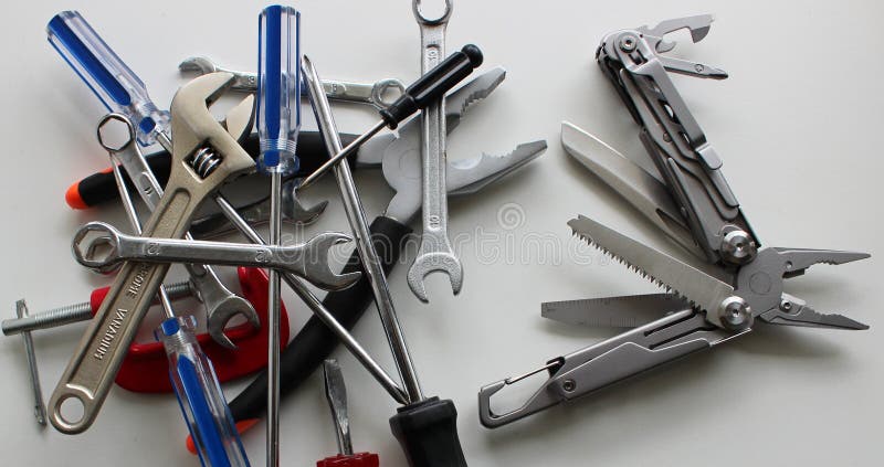 Half-opened Full Metal Multi-tool with Different Blades and Stacked ...